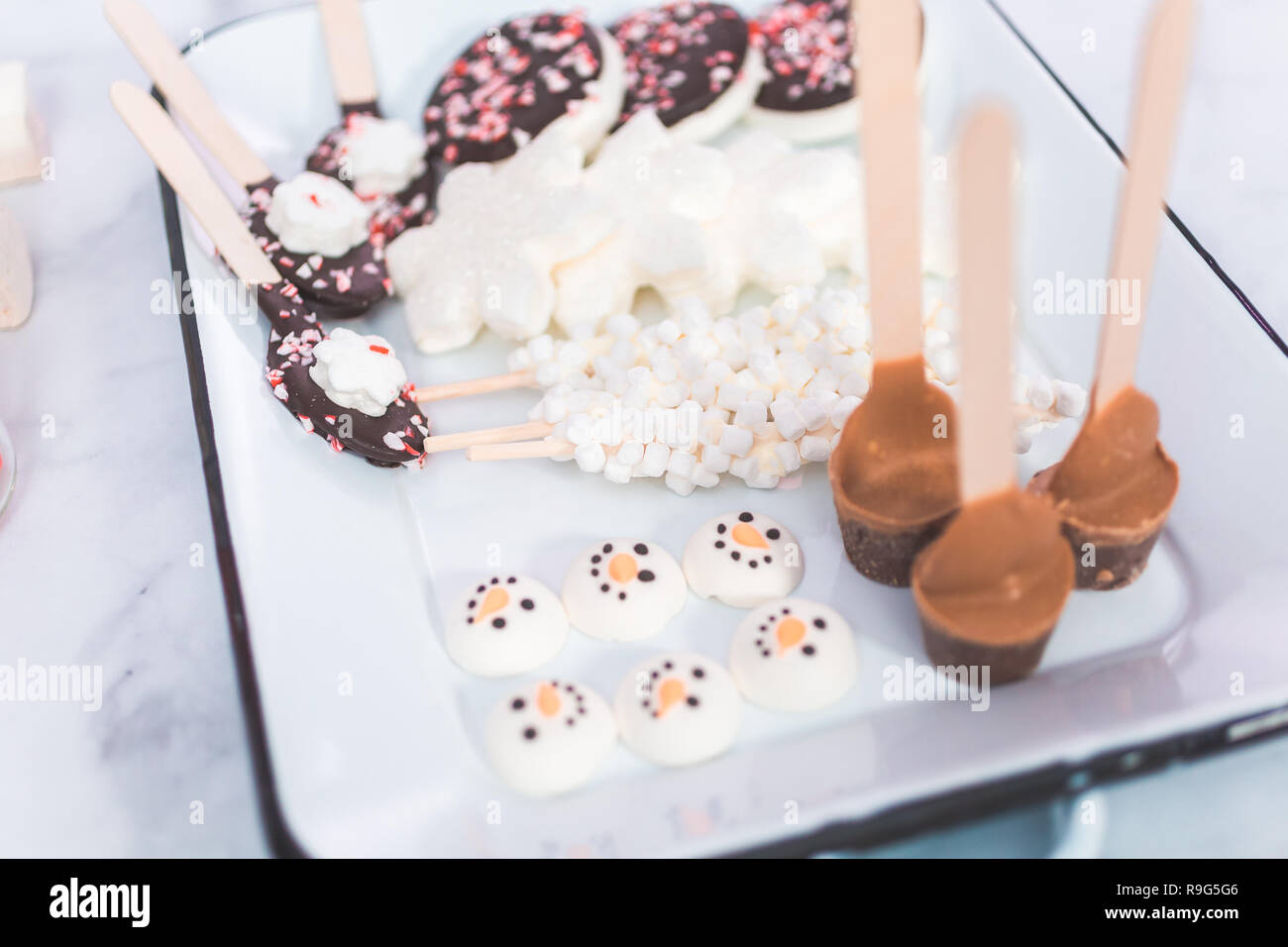 Close up view. Variety of marshmallow toppings with peppermint and ...