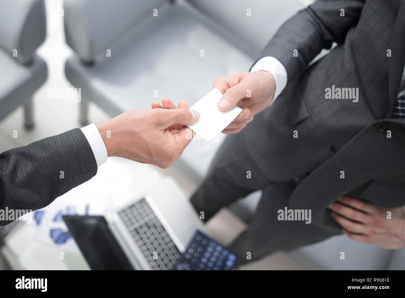 business partners exchanging business cards Stock Photo - Alamy