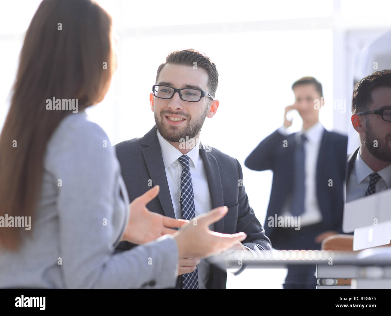Confident man talking to his interviewer during a job interview Stock ...