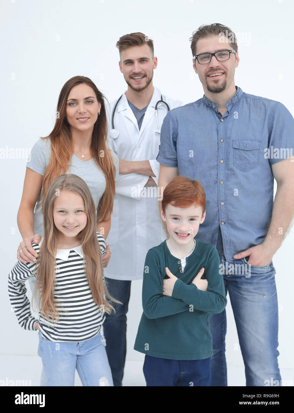 portrait of a modern family with their family doctor Stock Photo - Alamy