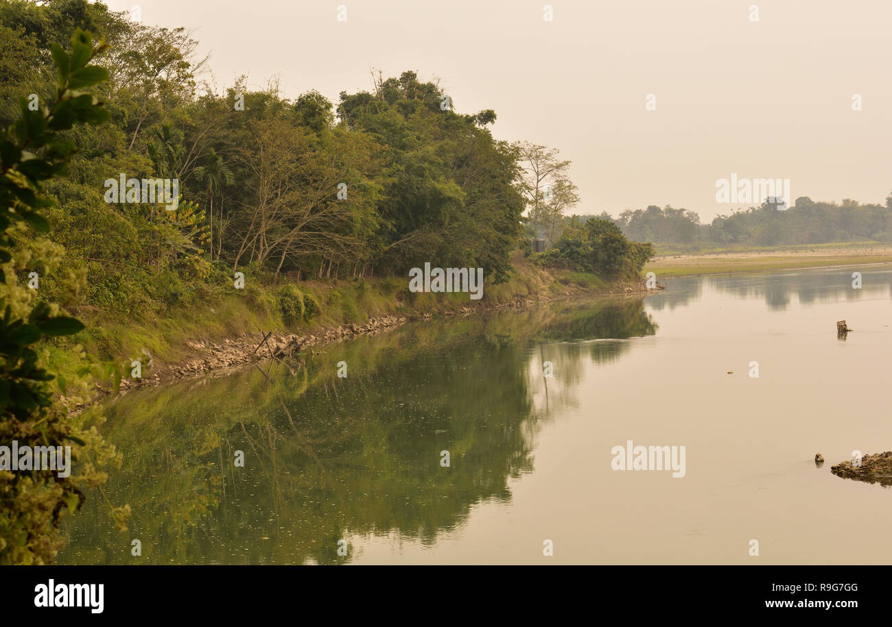 landscape view of river with its bank and trees reflection on it Stock ...