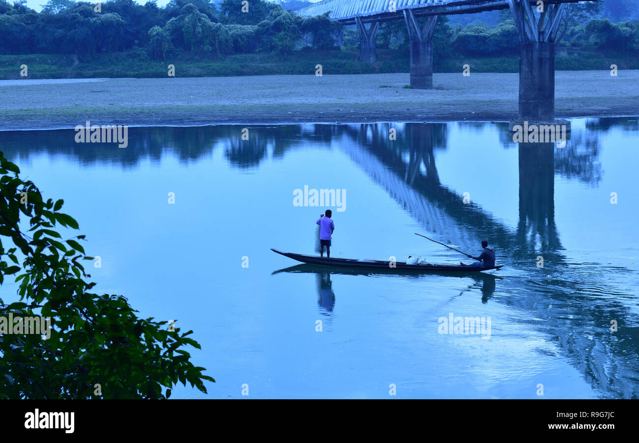 Fishing on river with beautiful background and reflection on water ...
