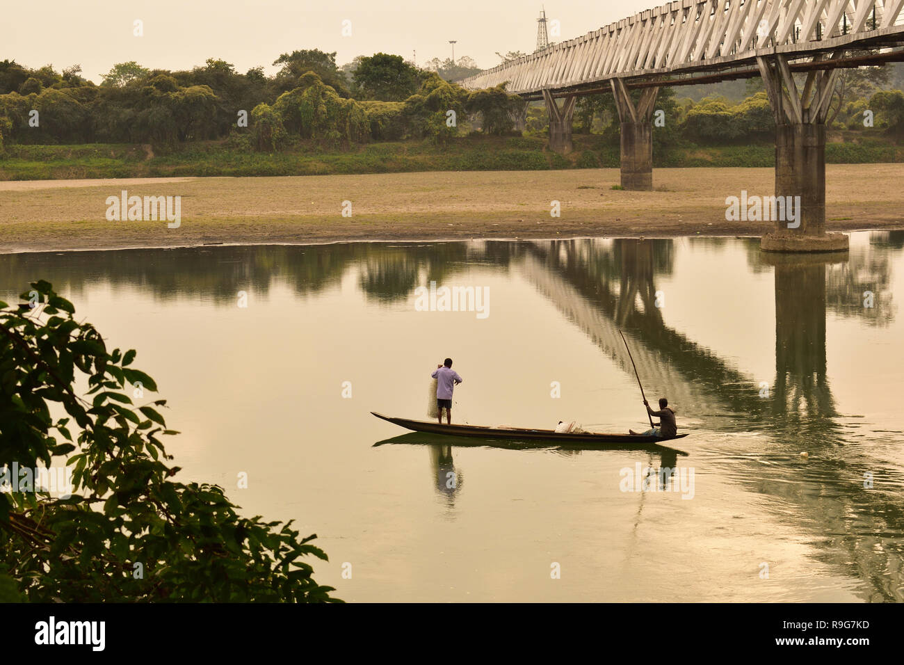 Fishing on river with beautiful background and reflection on water ...