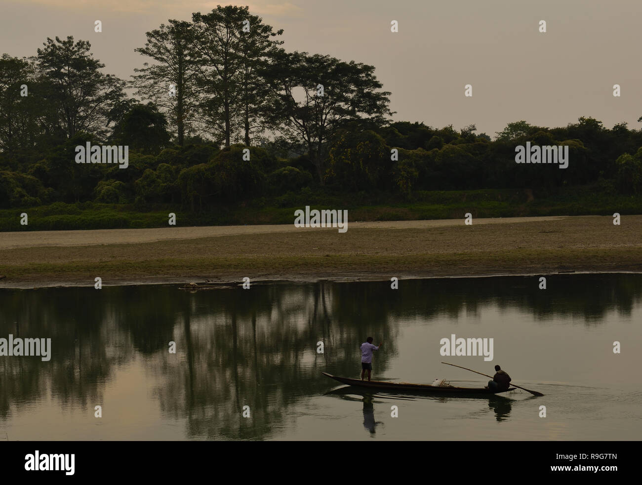 Fishing on river with beautiful background and reflection on water ...