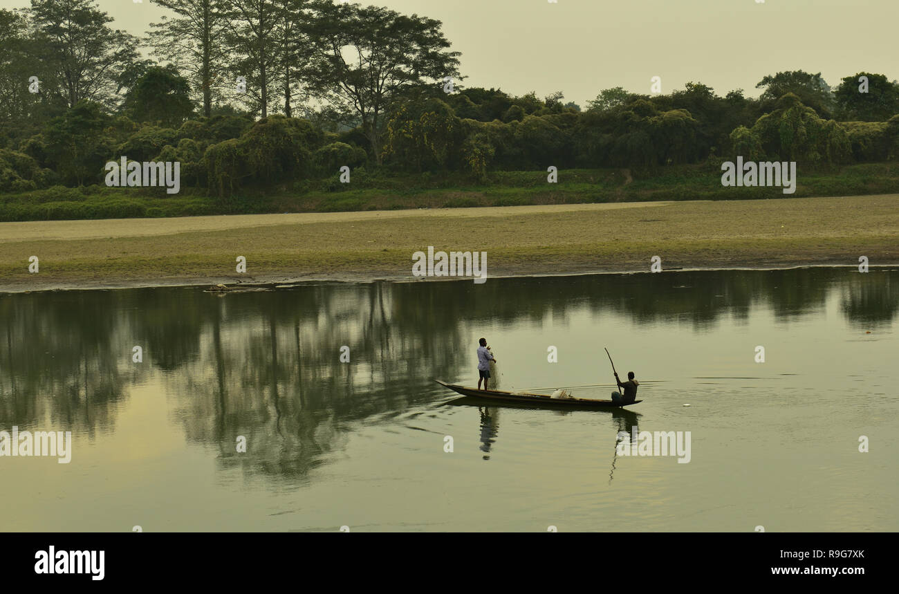 Fishing on river with beautiful background and reflection on water ...