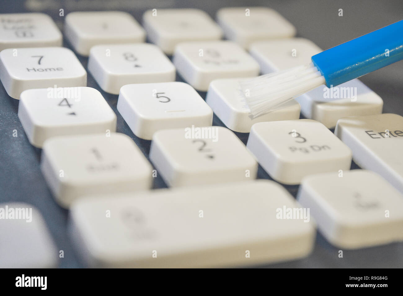 Closeup photo of cleaning and caring computer and computer peripherals ...