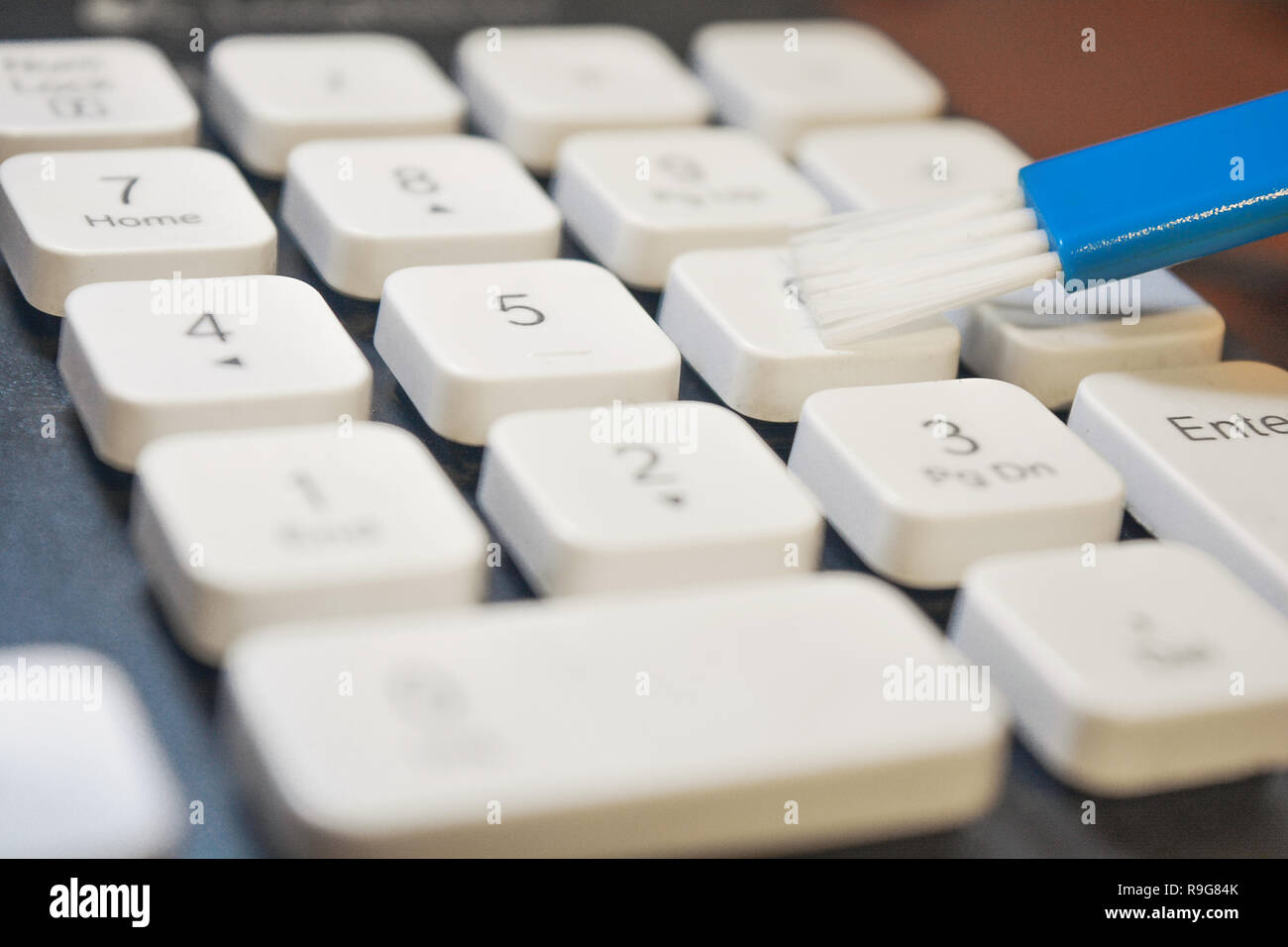 Closeup photo of cleaning and caring computer and computer peripherals ...