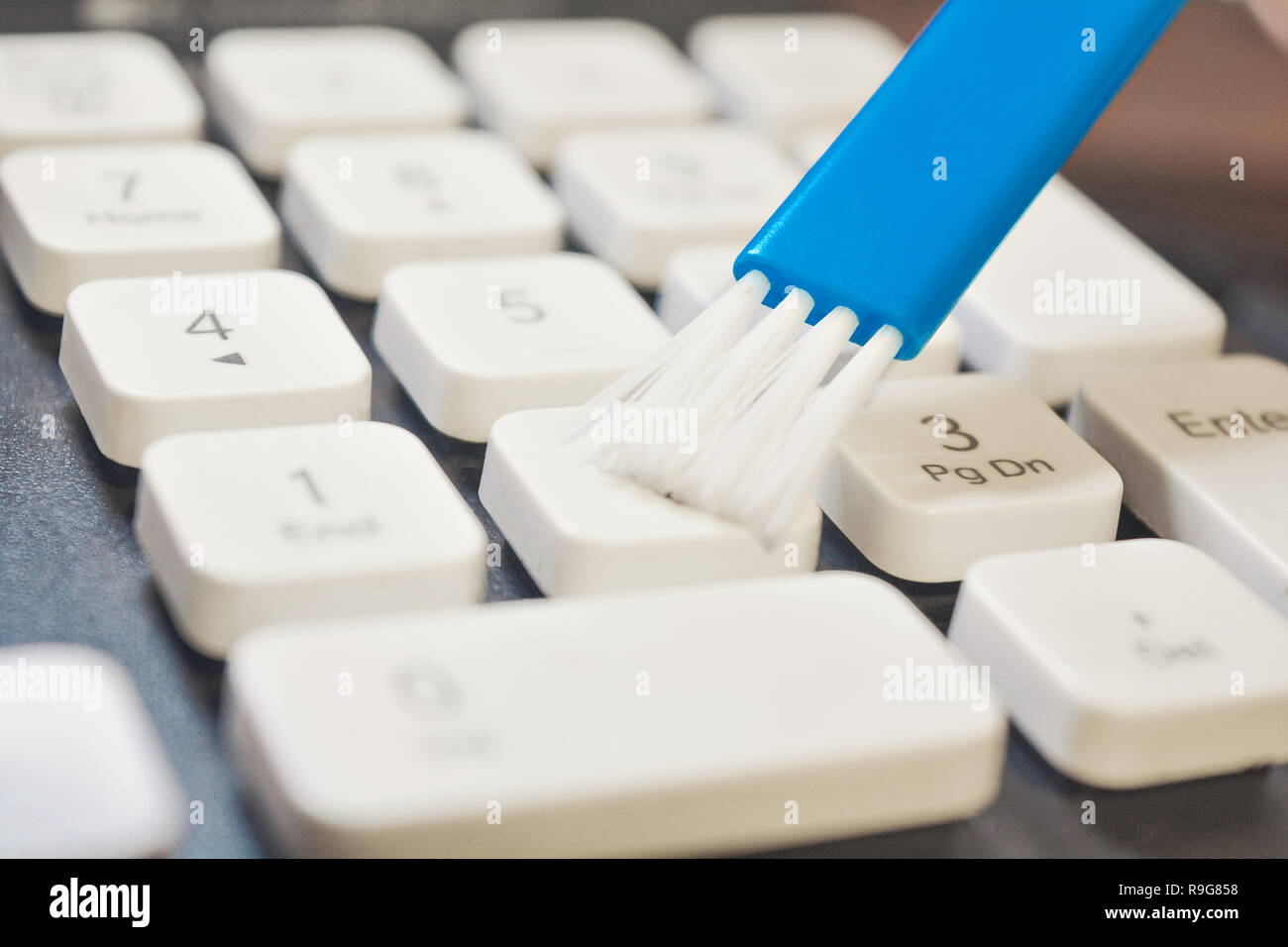 Closeup photo of cleaning and caring computer and computer peripherals ...