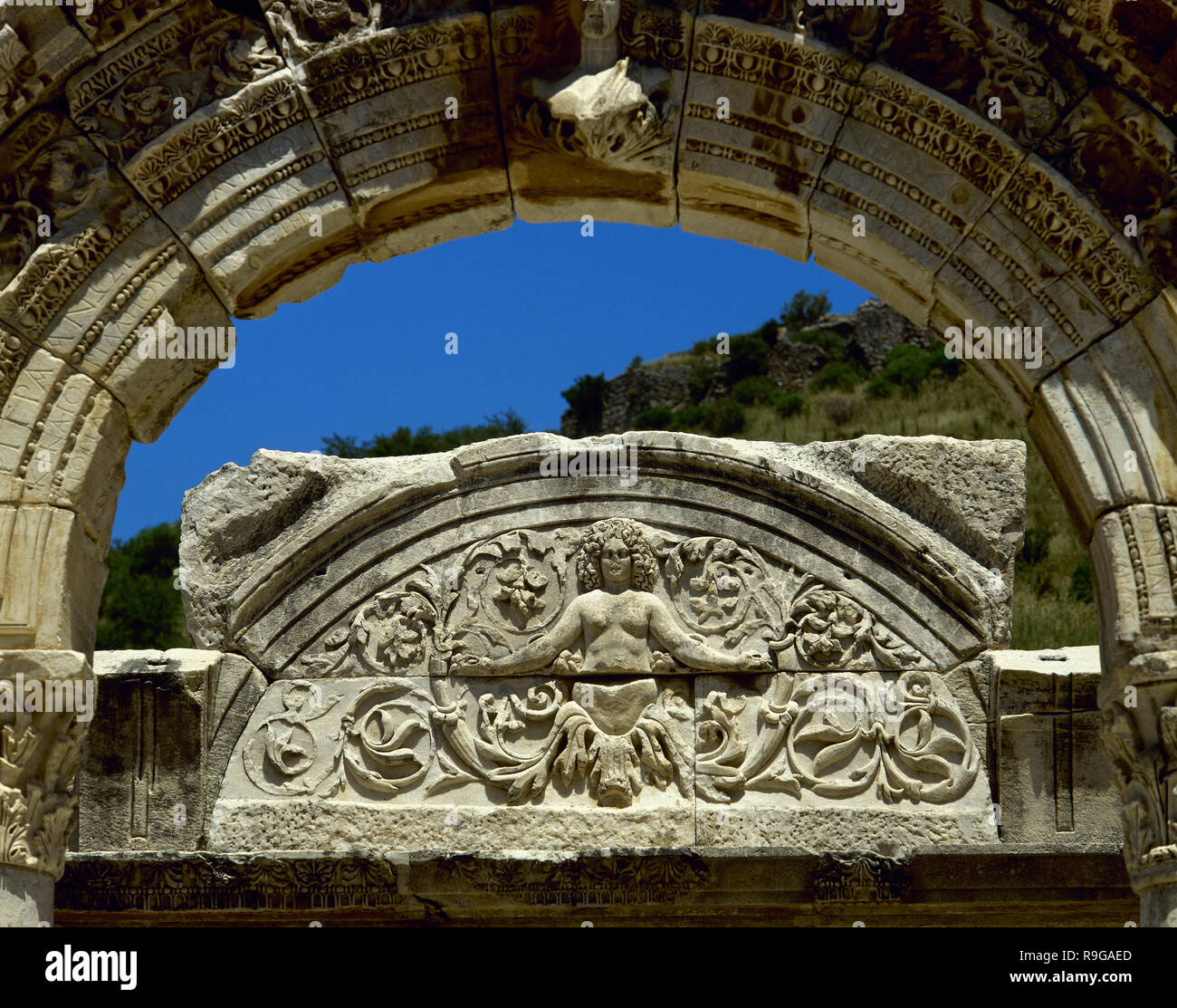 Ephesus. Temple of Hadrian. Arch on the front facade with reliefs ...
