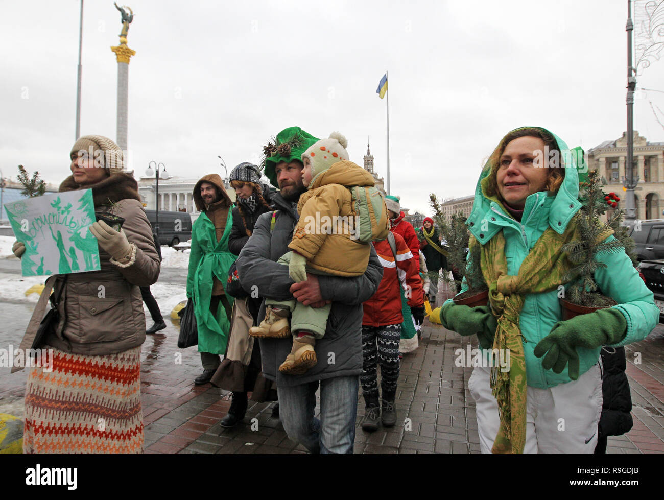A Participant seen holding a drawing during the Eco Santa Claus ...