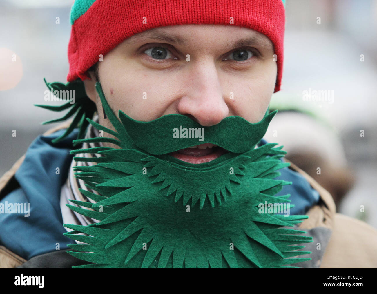 A Participant seen wearing a green mask during the Eco Santa Claus ...