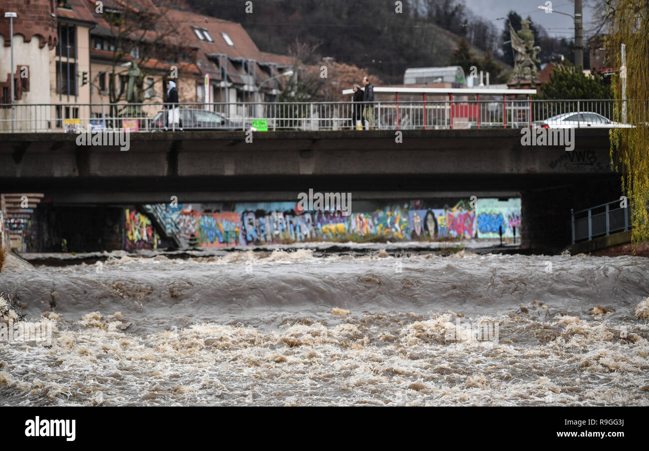 Freiburg, Germany. 24th Dec, 2018. A lot of water flows in the Dreisam ...