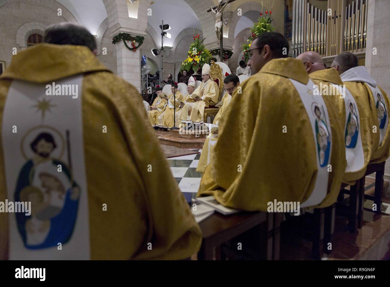 Bethlehem, West Bank, Palestinian Territory. 24th Dec, 2018. Archbishop ...