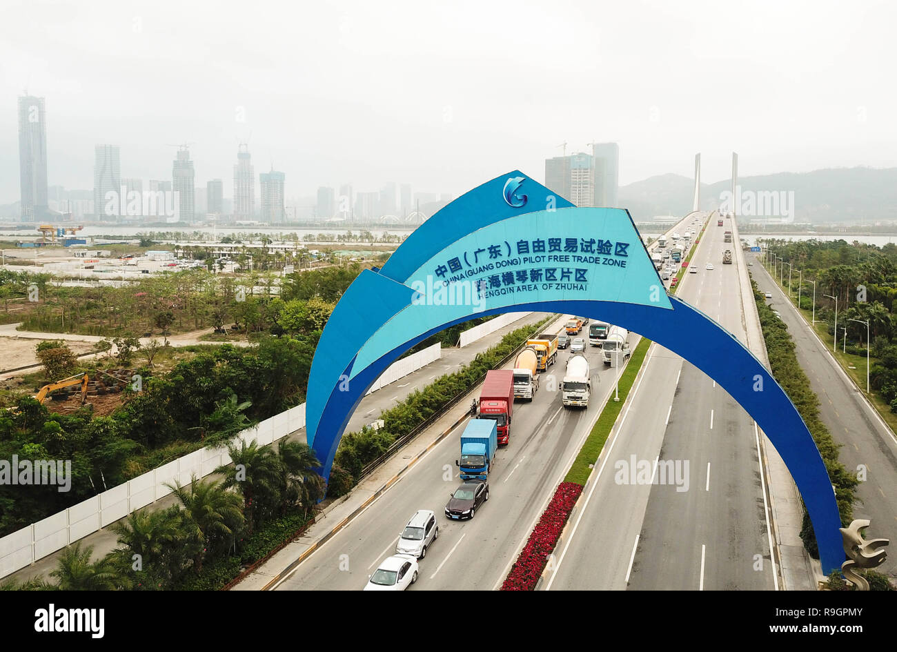 Beijing, China's Guangdong Province. 15th Nov, 2018. Vehicles run on ...