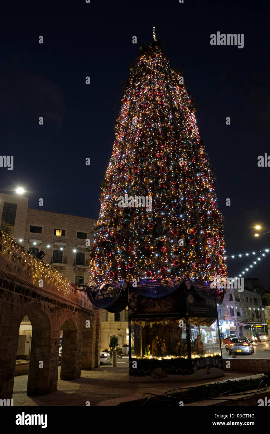 A fully decorated Christmas tree displayed at the entrance to the city ...