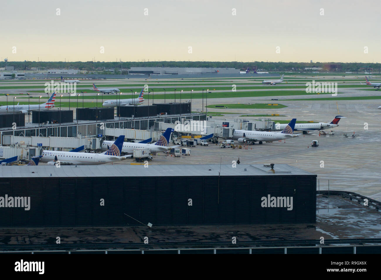 CHICAGO, ILLINOIS, UNITED STATES - MAY 11th, 2018: Several airplanes at ...