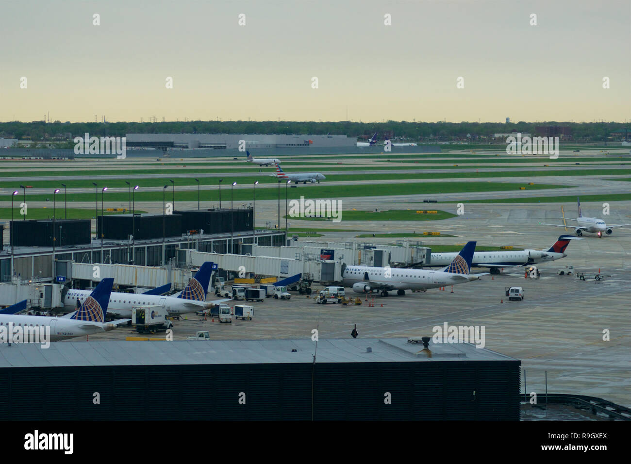 CHICAGO, ILLINOIS, UNITED STATES - MAY 11th, 2018: Several airplanes at ...