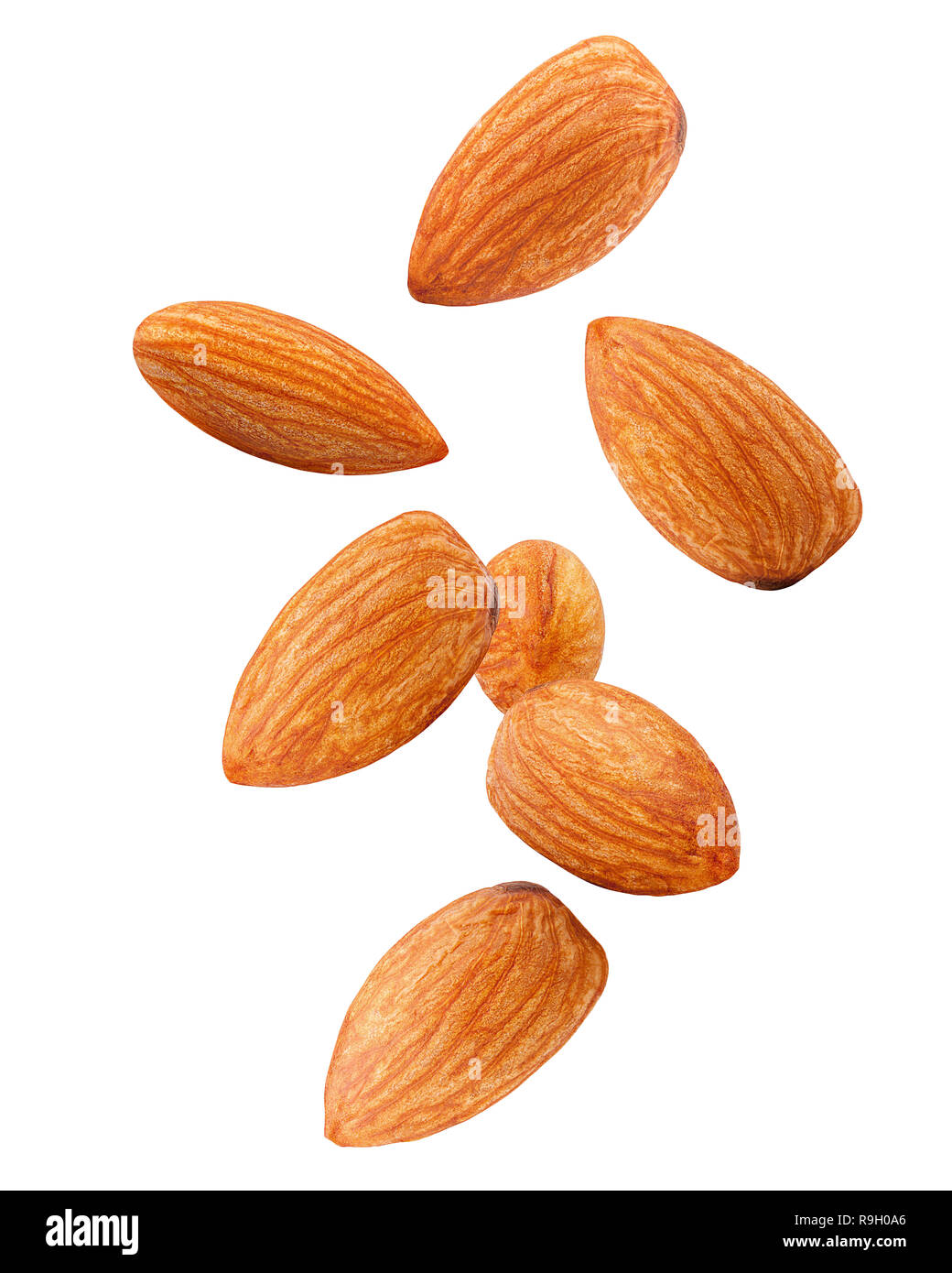 Falling almond isolated on white background, clipping path, full depth ...