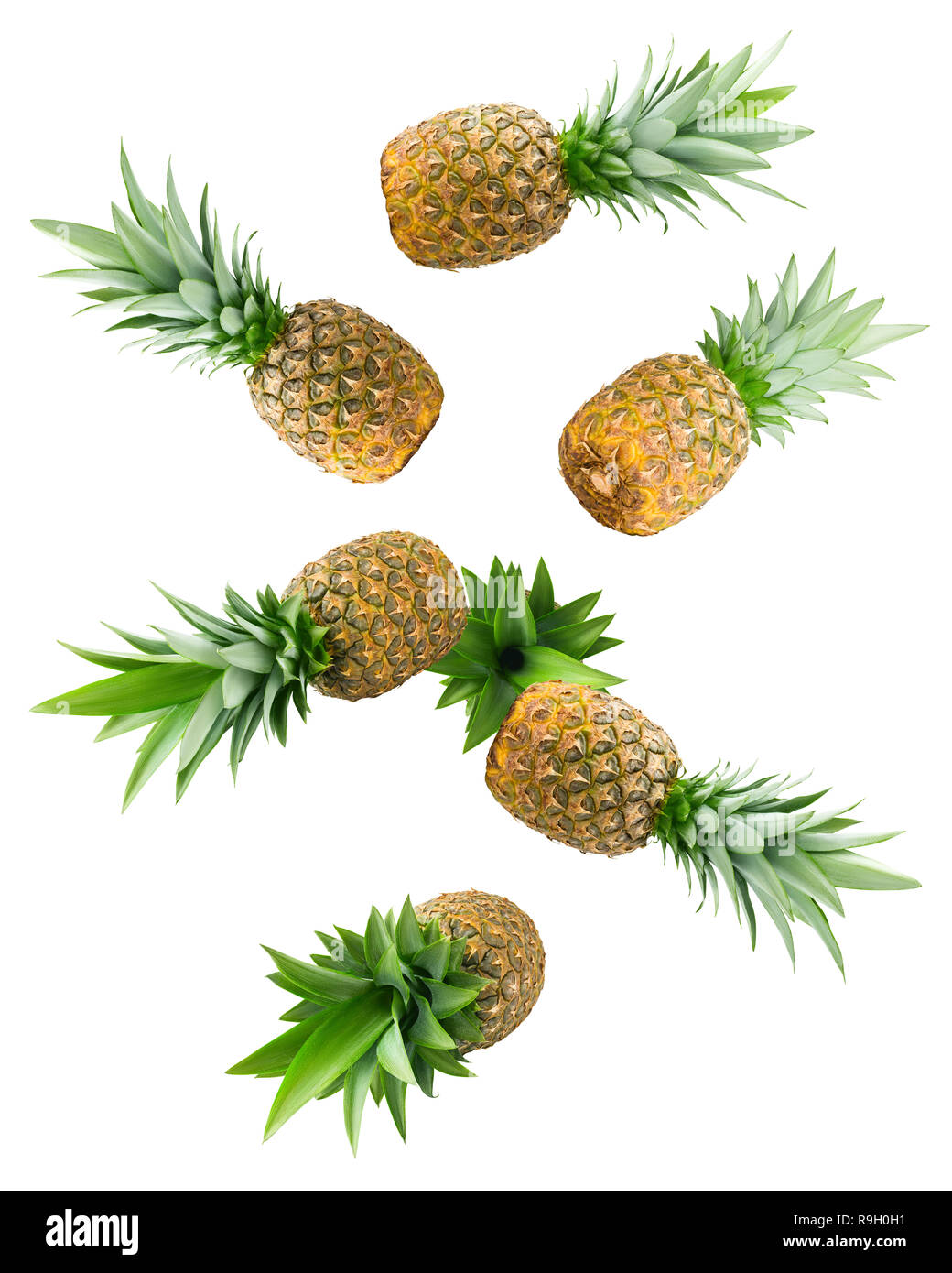 Falling pineapple isolated on white background, clipping path, full ...