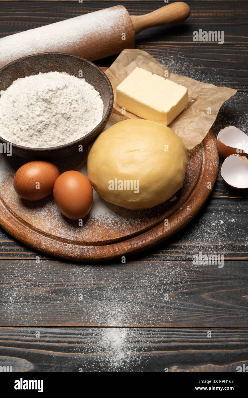 unrolled and unbaked Shortcrust pastry dough recipe on wooden ...