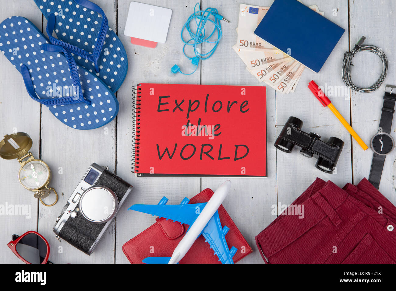 Adventure time - plane, passport, money, camera, compass, note pad with ...