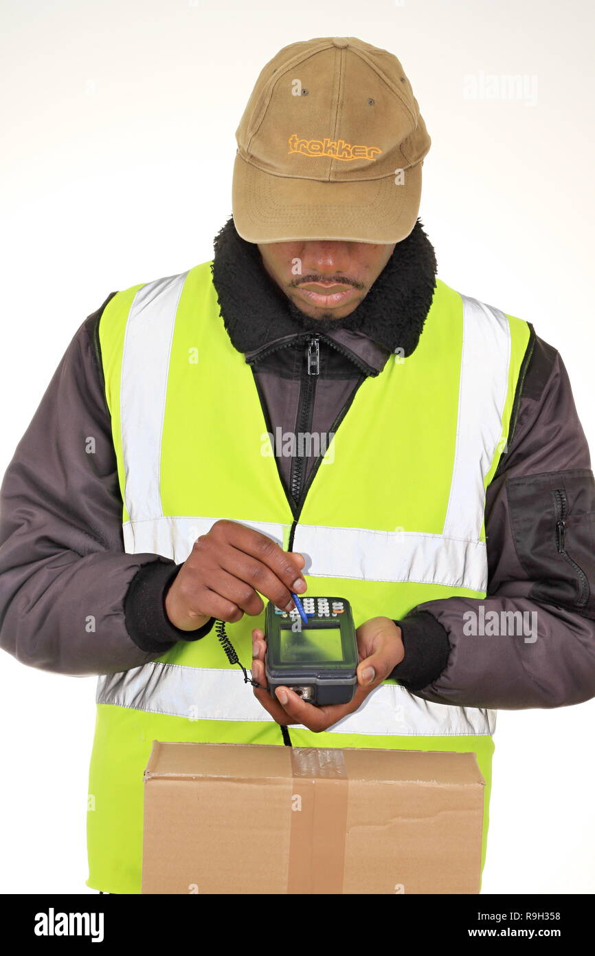 Delivery man delivering parcel hi-res stock photography and images - Alamy