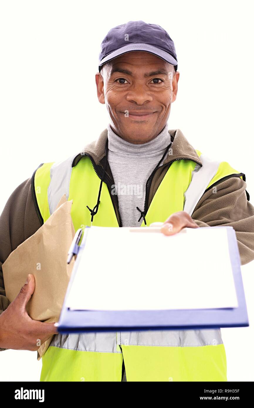 delivery man delivering parcel stock photo Stock Photo - Alamy