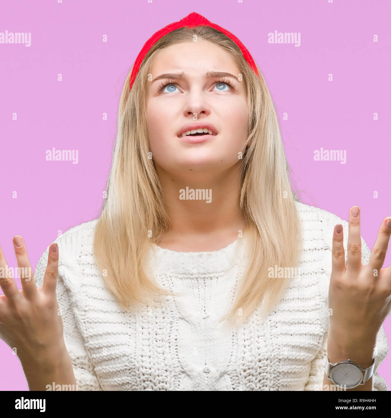 Young caucasian woman wearing winter sweater over isolated background ...