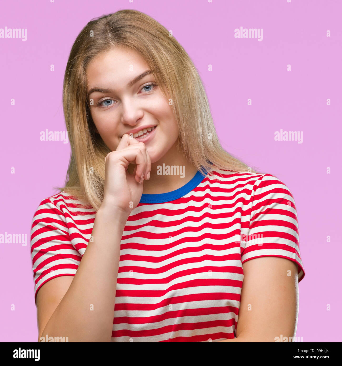 Young caucasian woman over isolated background looking confident at the ...
