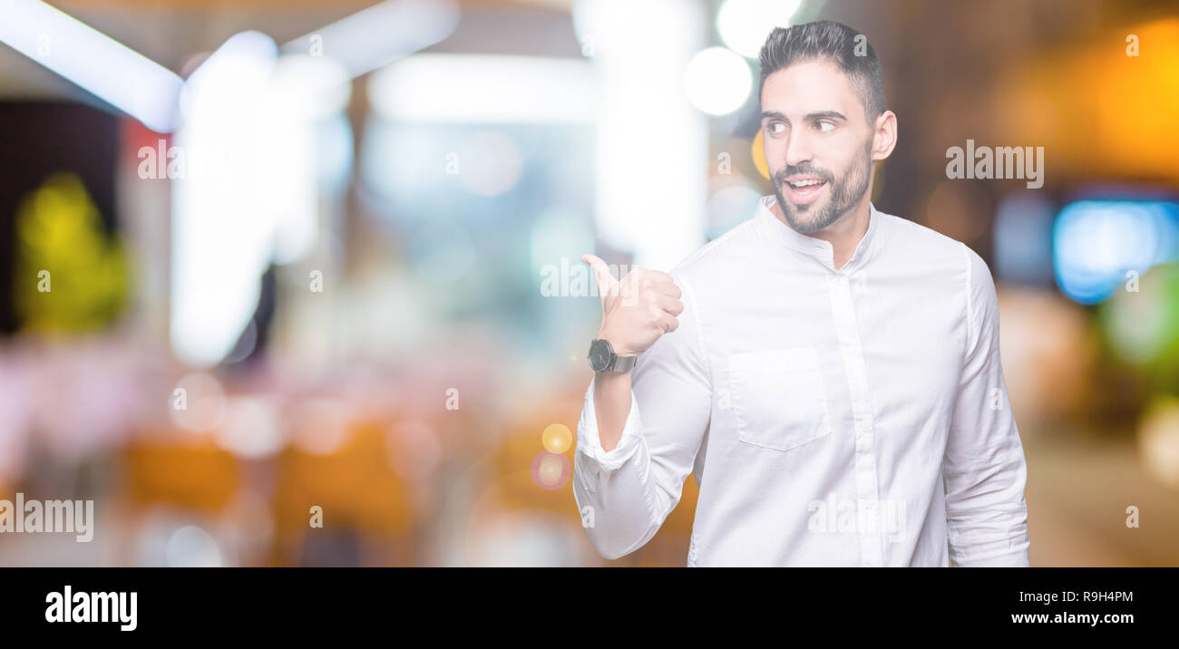 Young business man over isolated background smiling with happy face ...