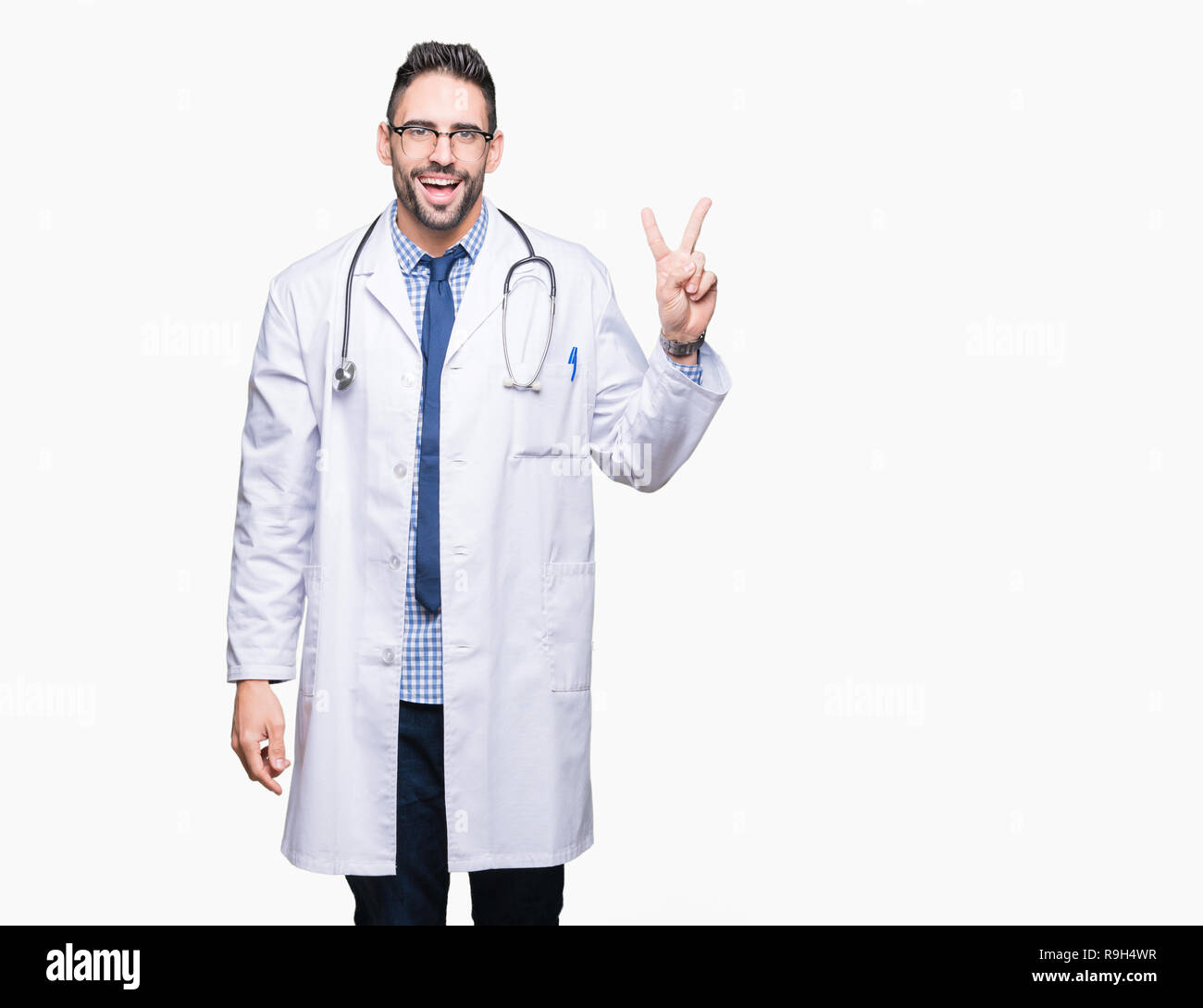 Doctor victory! young hispanic man Cut Out Stock Images & Pictures - Alamy