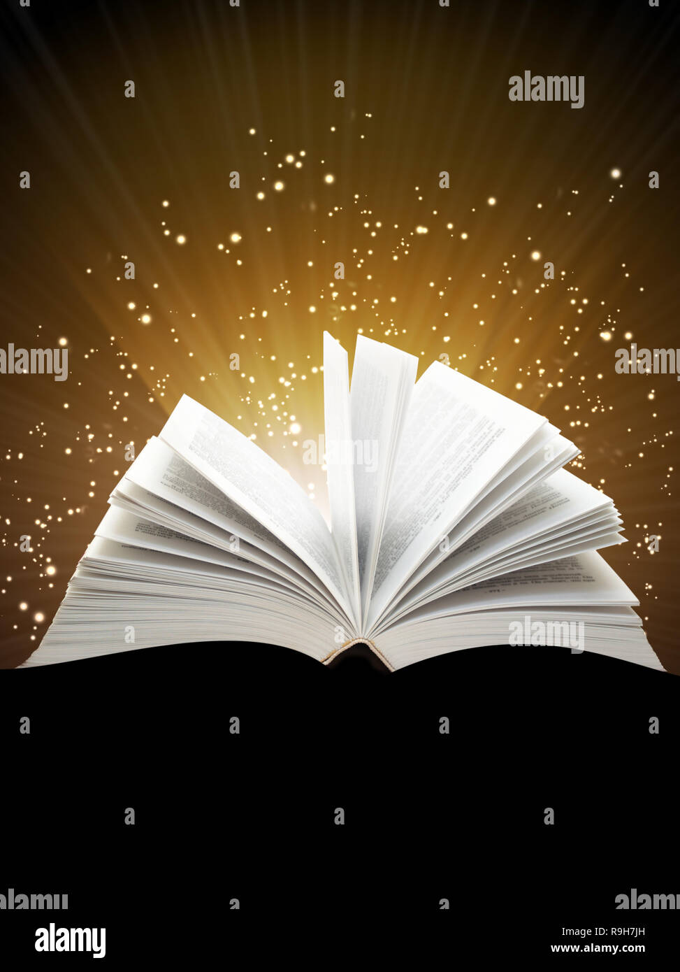 Border with magic book. On black background Stock Photo - Alamy