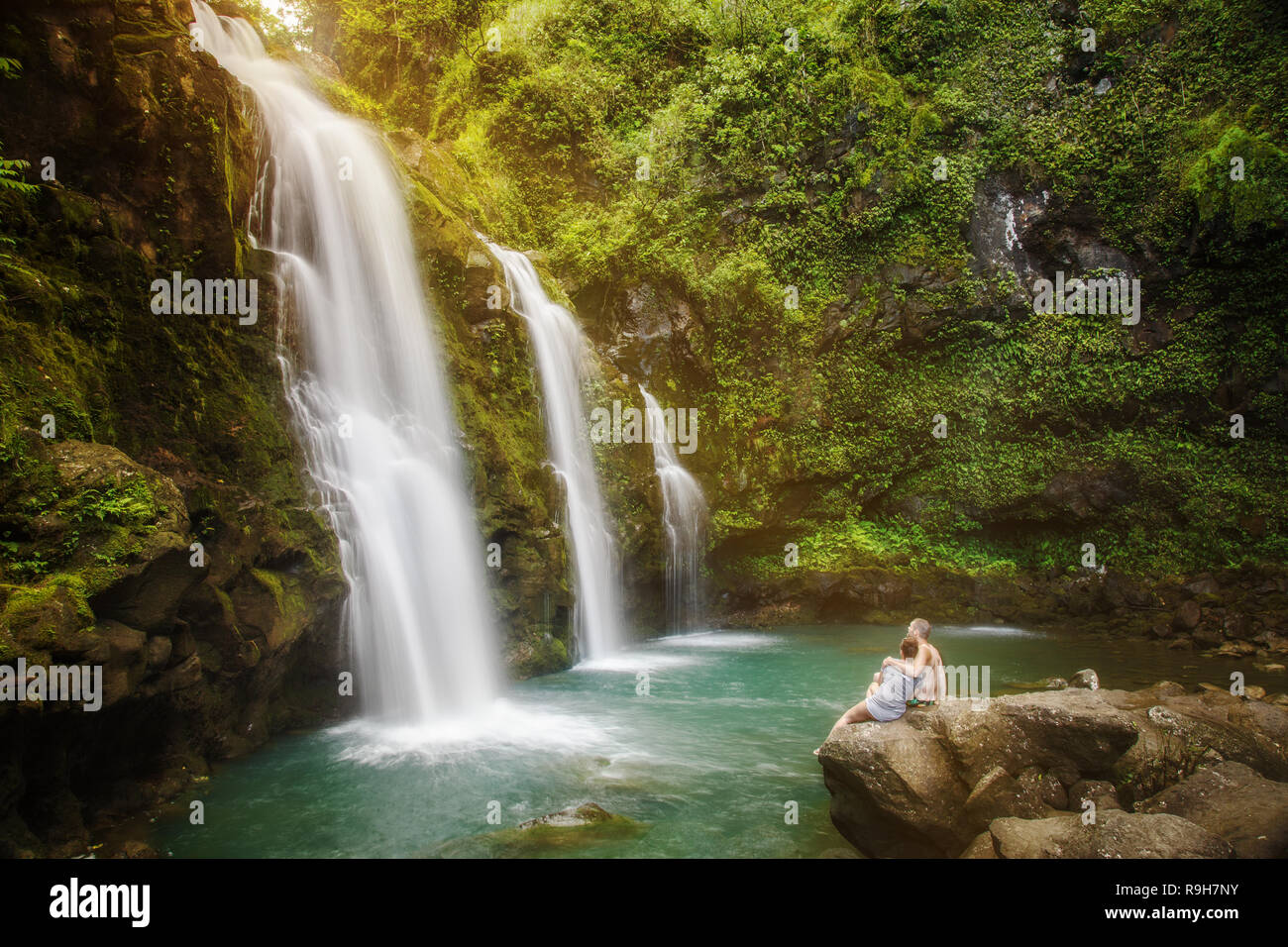 Upper Waikani Falls Hawaii couple in love romantic getaway Stock Photo ...
