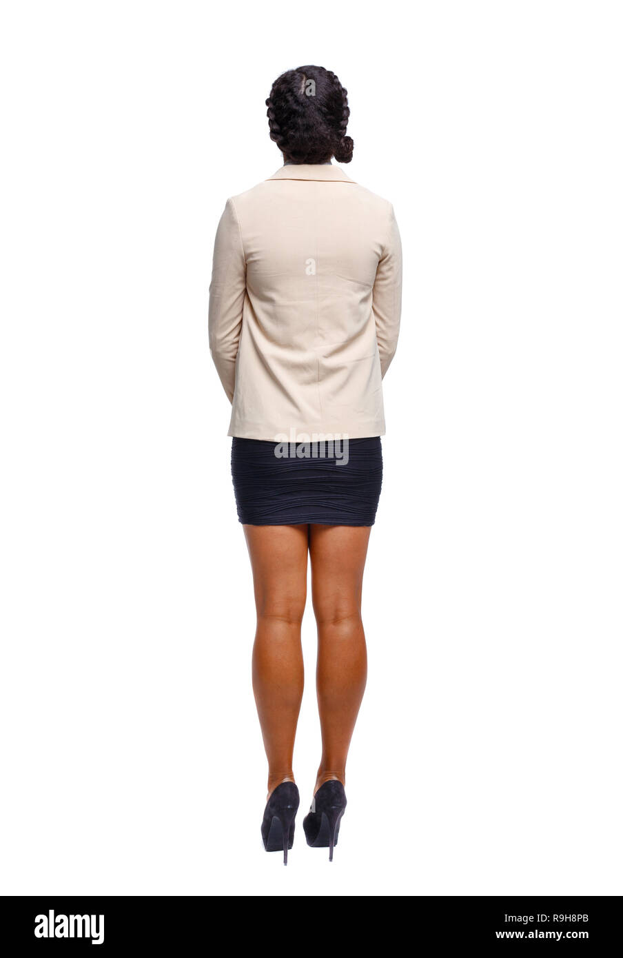 Back view of an African-American woman in suit. girl watching. Rear ...