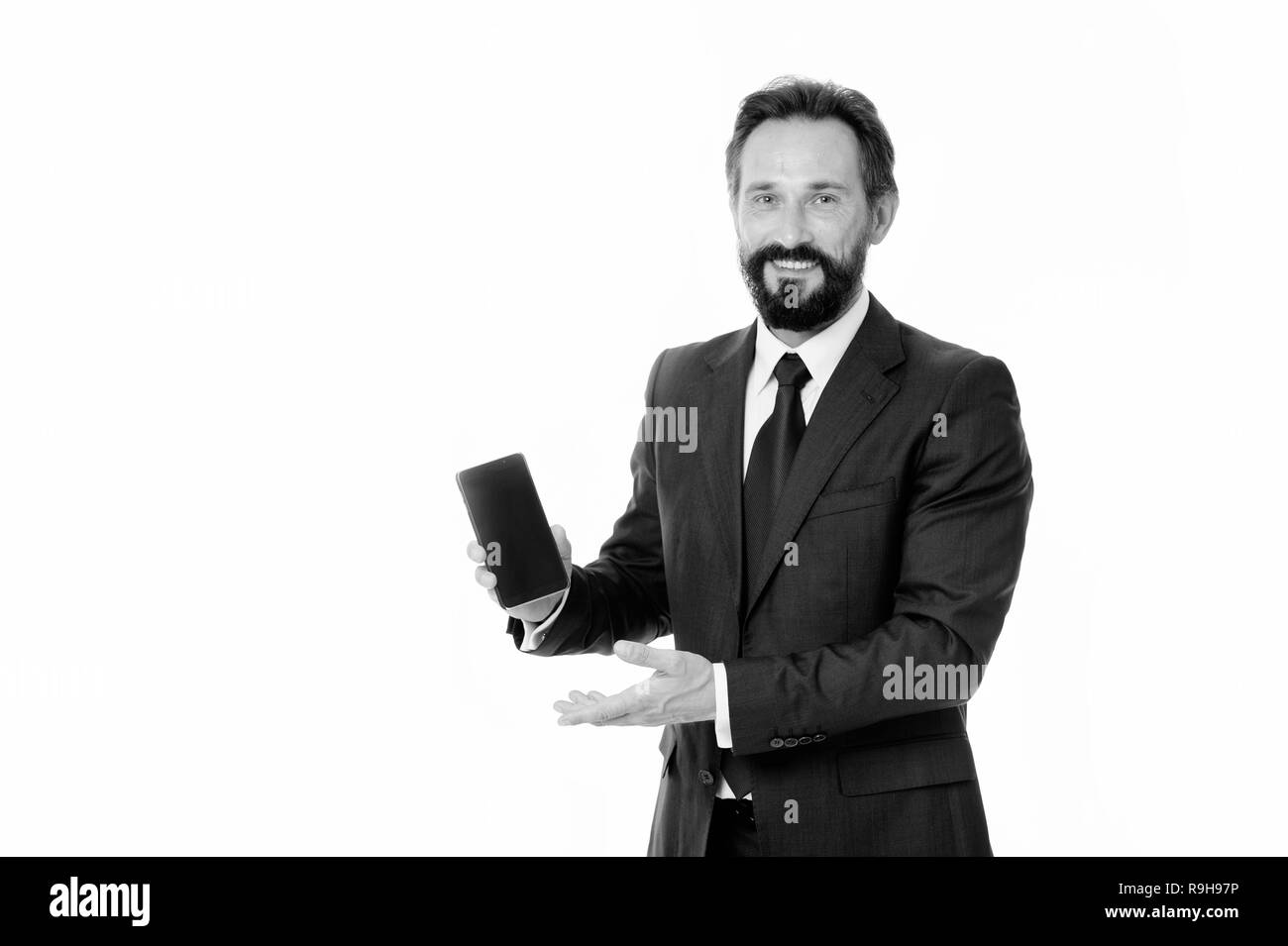 Businessman formal suit holds smartphone. Man bearded businessman glad ... Businessman formal suit holds smartphone. Man bearded businessman glad ...