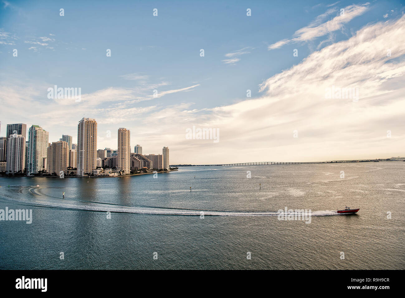 Miami skyline skyscrapers ,yacht or boat sailing next to Miami downtown ...