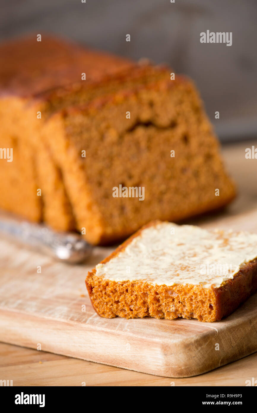 Slices of 'ontbijtkoek', traditional Dutch spice bread, with butter ...