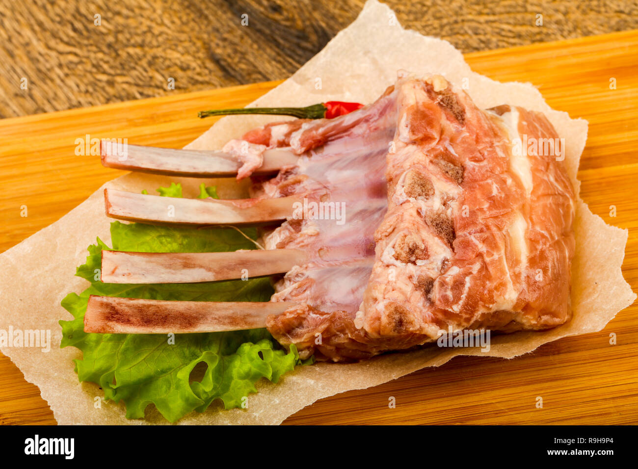 Raw lamb ribs with pepper ready for cooking Stock Photo - Alamy