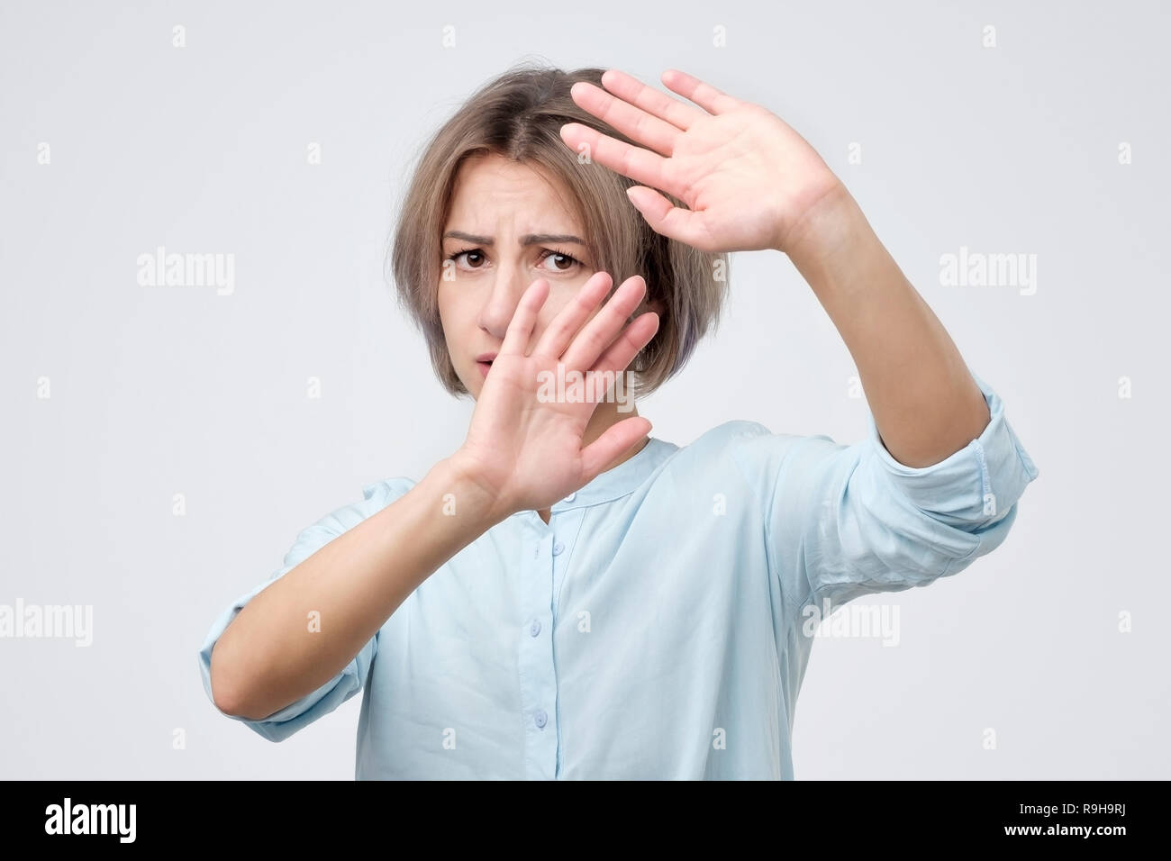 Woman showing her denial opinion on situation Stock Photo - Alamy