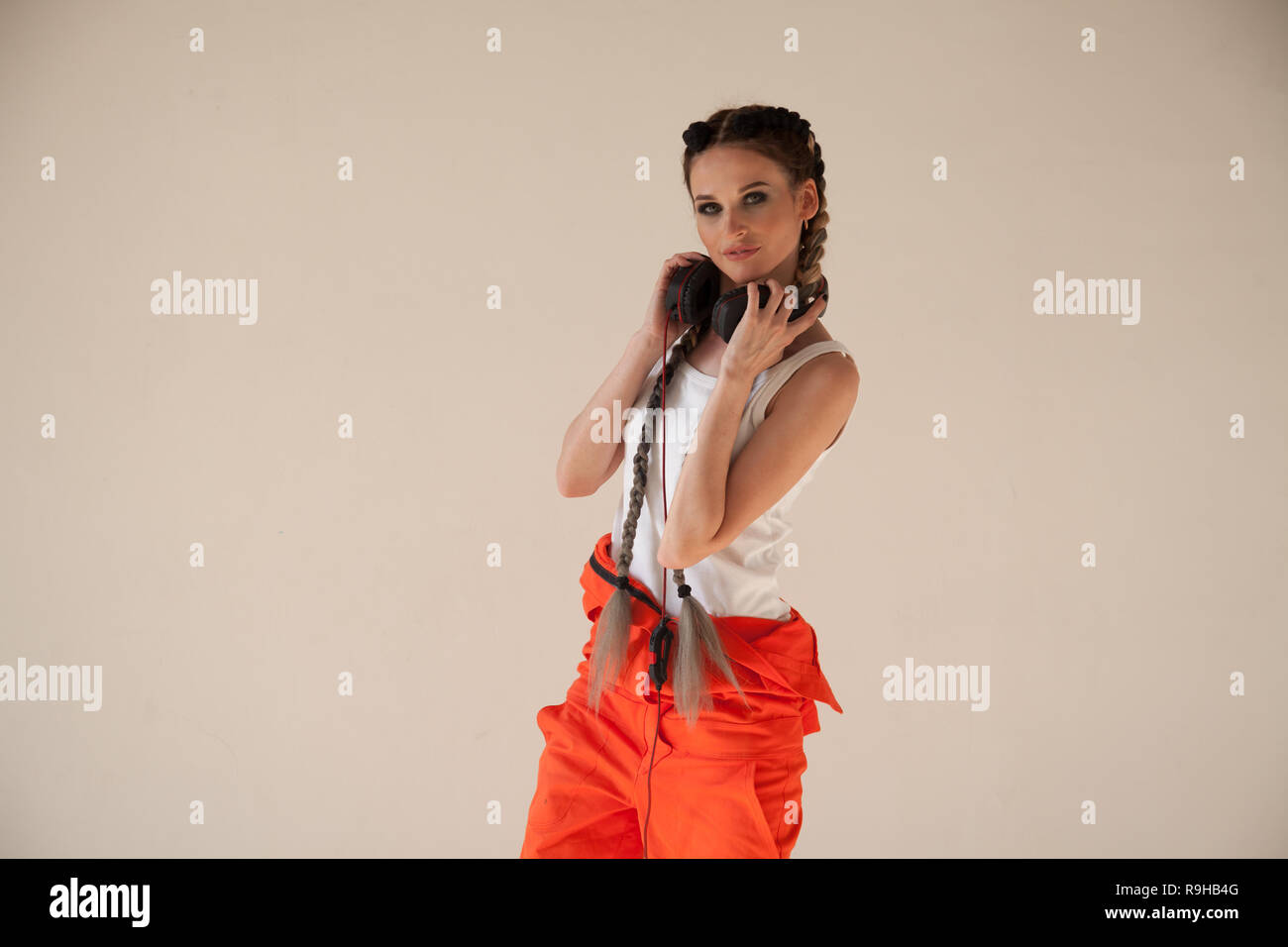 woman with braids dancing to the music Stock Photo - Alamy