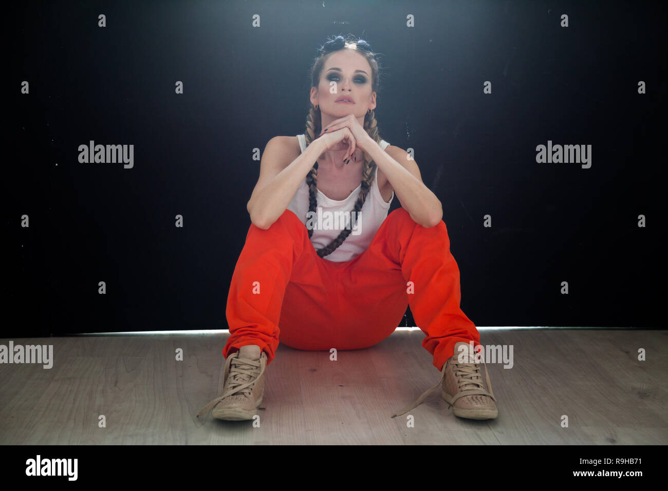 woman with braids dancing to the music Stock Photo - Alamy
