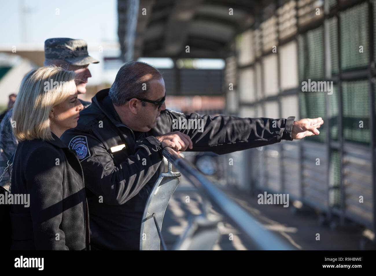 U.S. Customs Port Director Carlos Rodriguez, center, gives Homeland ...