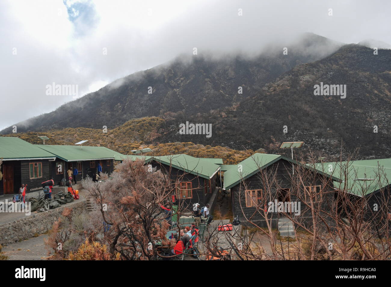 Mountain Huts against a foggy mountain background, Saddle hut, Arusha ...