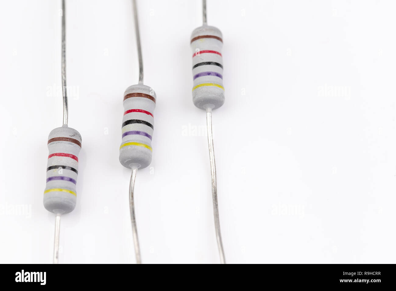 3 three electrical resistors isolated on a white background with ...