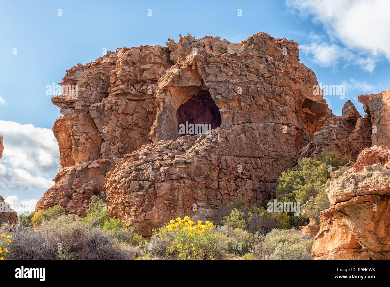 A rock formation, with an arch and a cave, at the Stadsaal Caves in the ...