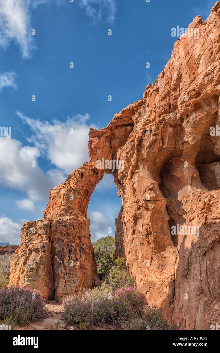 A rock formation, with an arch and a cave, at the Stadsaal Caves in the ...