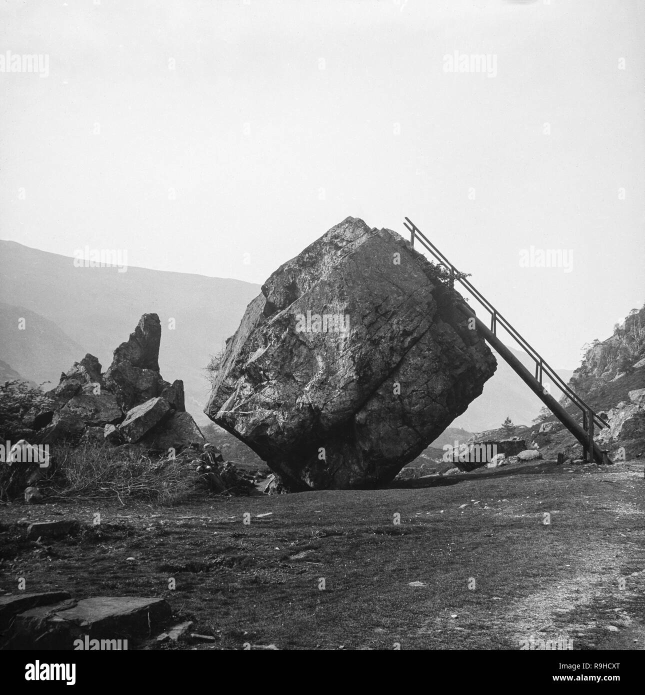 A late Victorian black and white photograph of the Bowder Stone ...