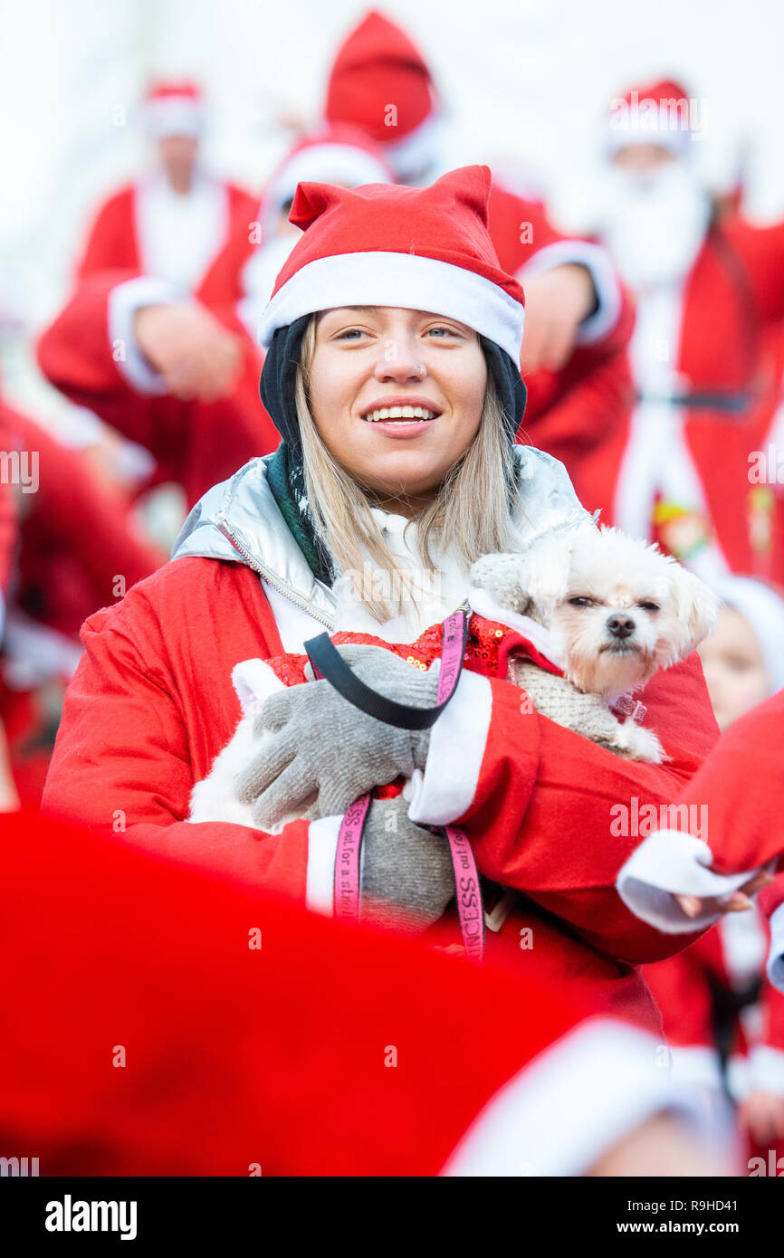 Edinburgh Santa Run, Princes street Gardens Robyn Rae and her dog Belle ...