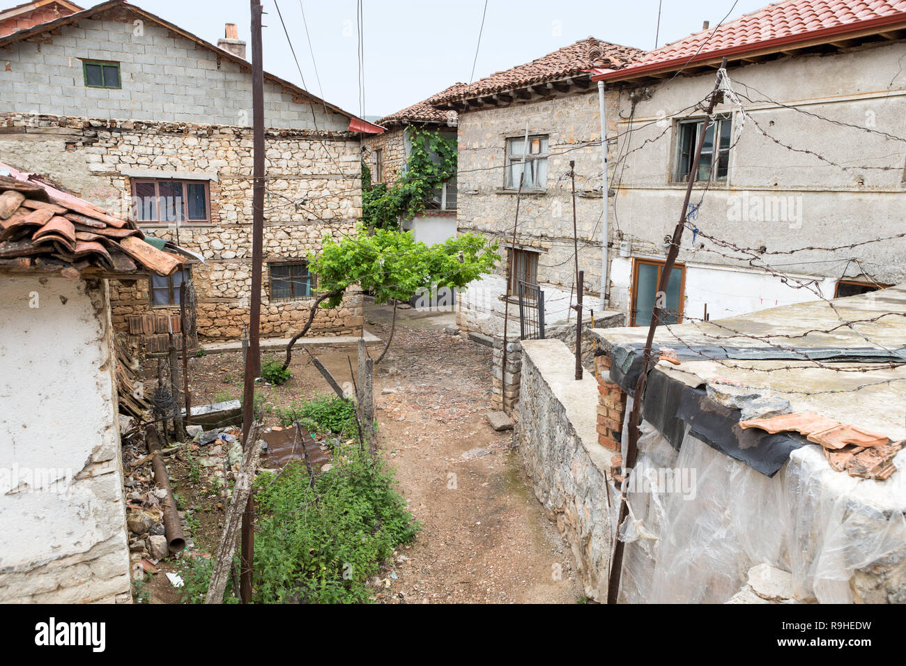 Lin village with barbed wire Albania Stock Photo - Alamy