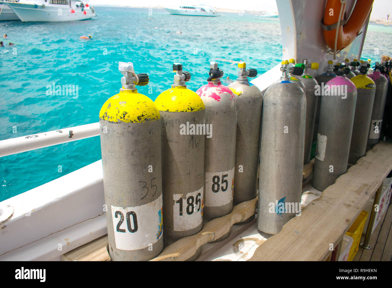 equipment for diving. a row of balloons on a yacht against the ...